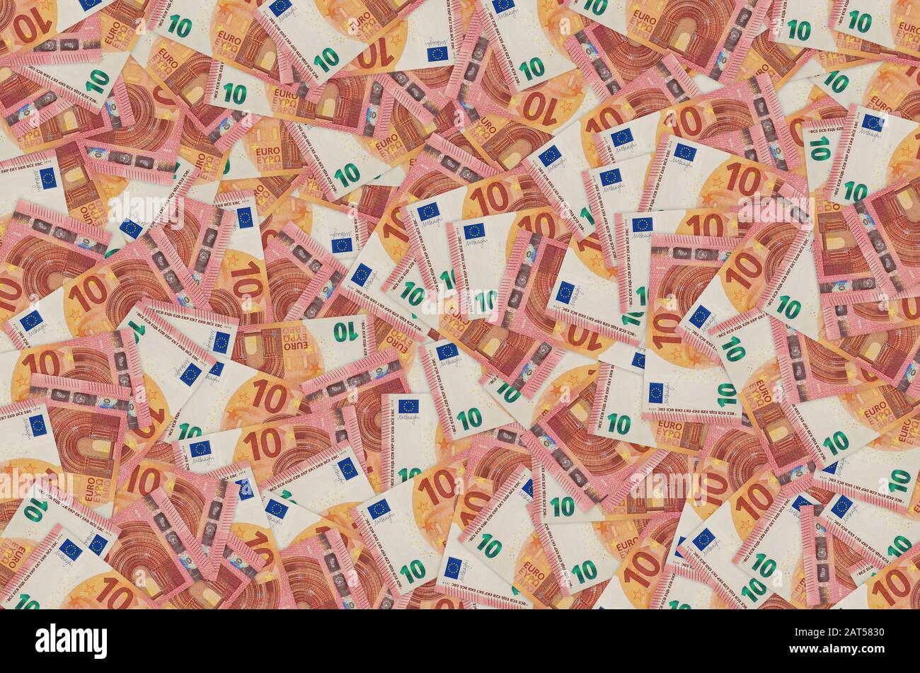 Pattern part of 10 euro banknote close-up with small red details ...