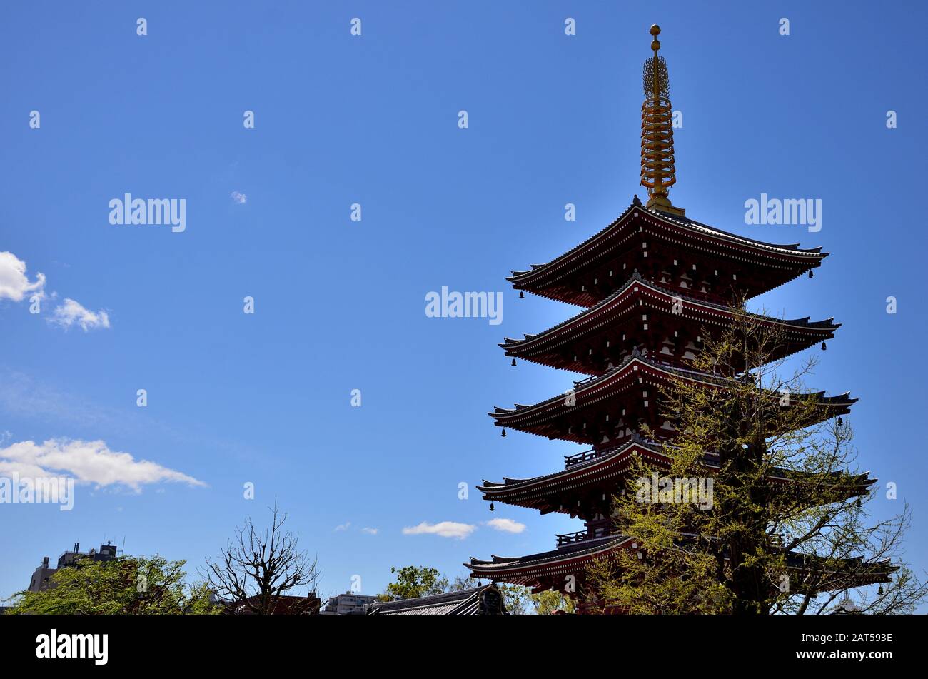 High pagoda tower near the main temple Stock Photo - Alamy
