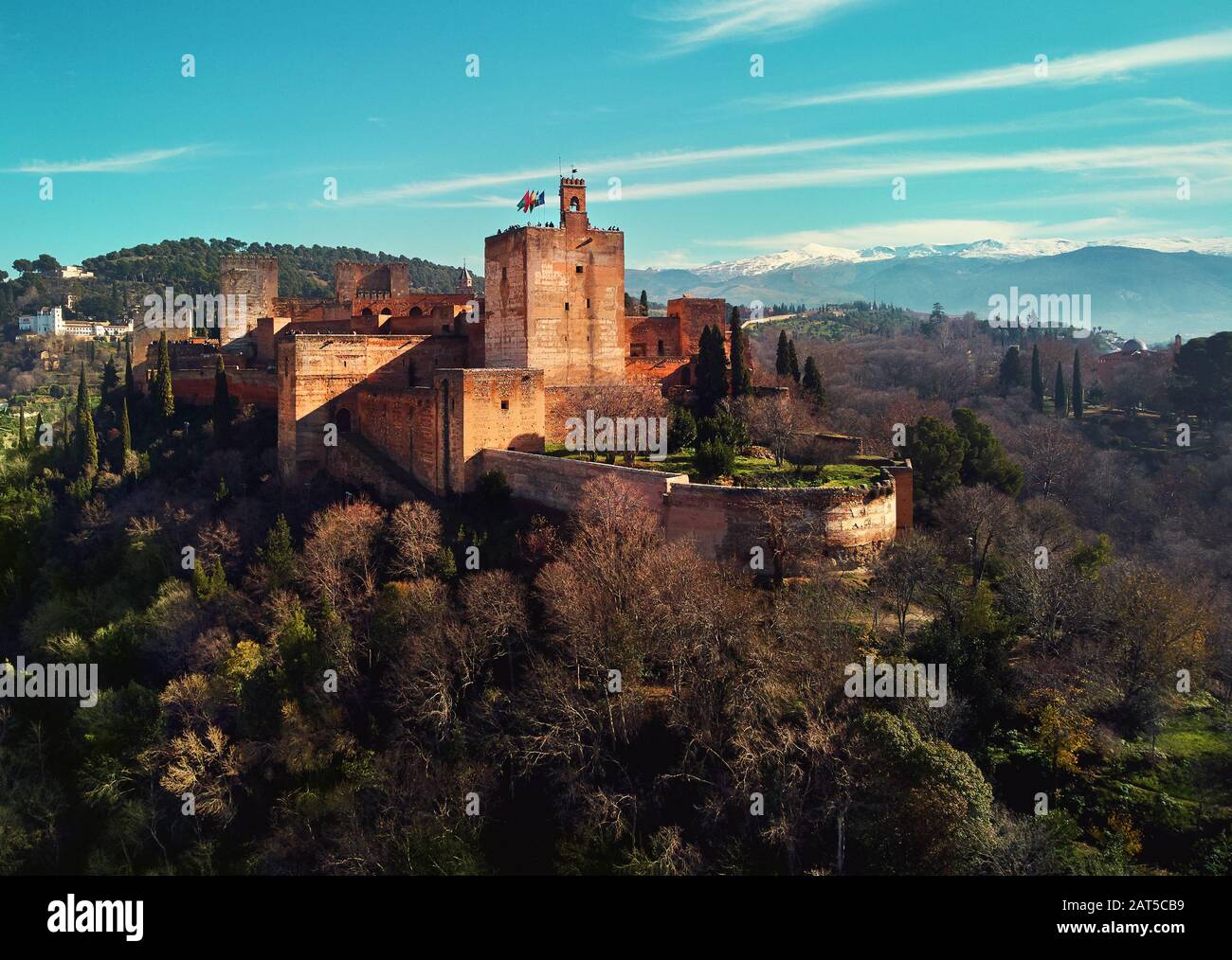 Aerial drone point of view Granada castle and surrounding lands meadows ...