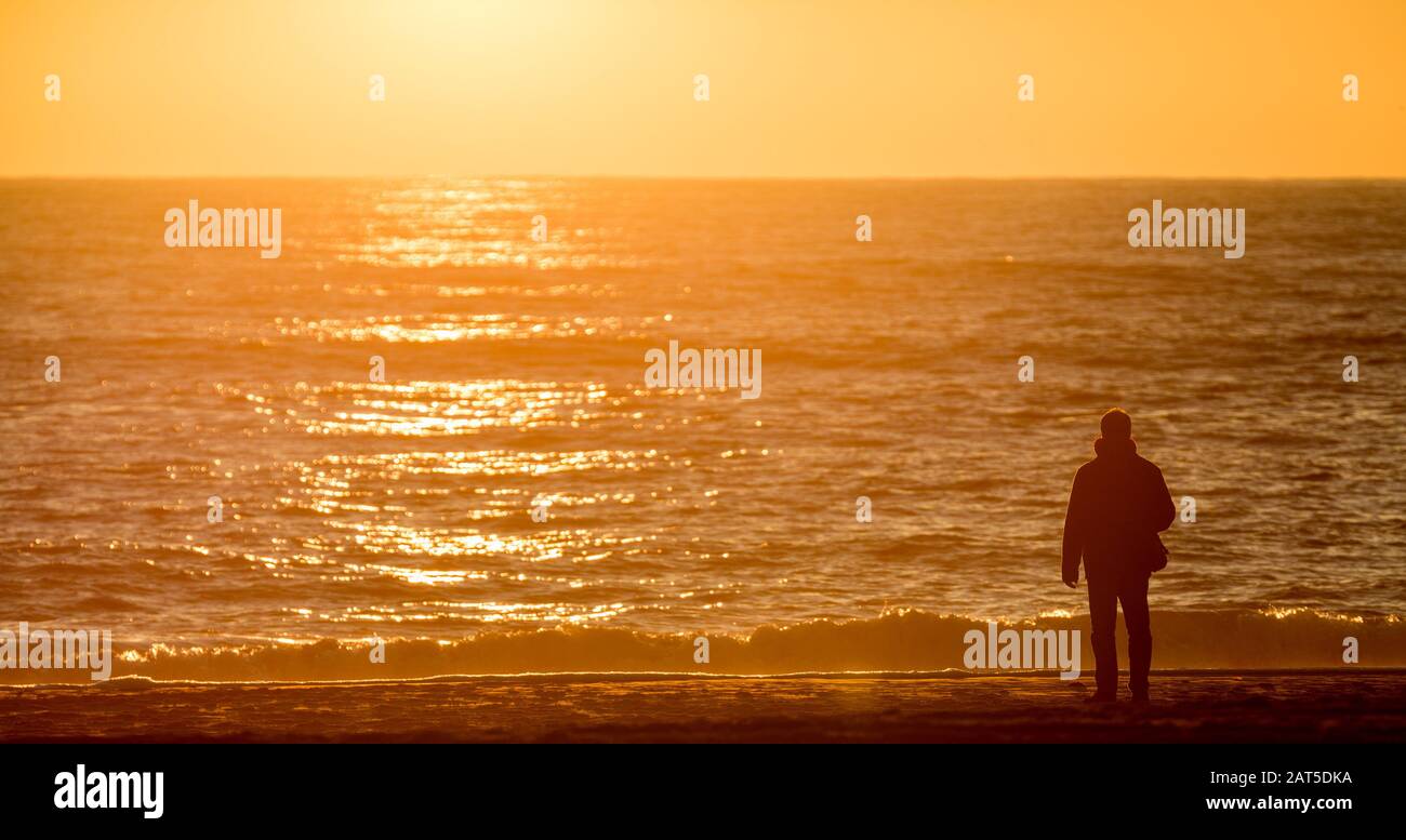 thinking at sunset Stock Photo - Alamy