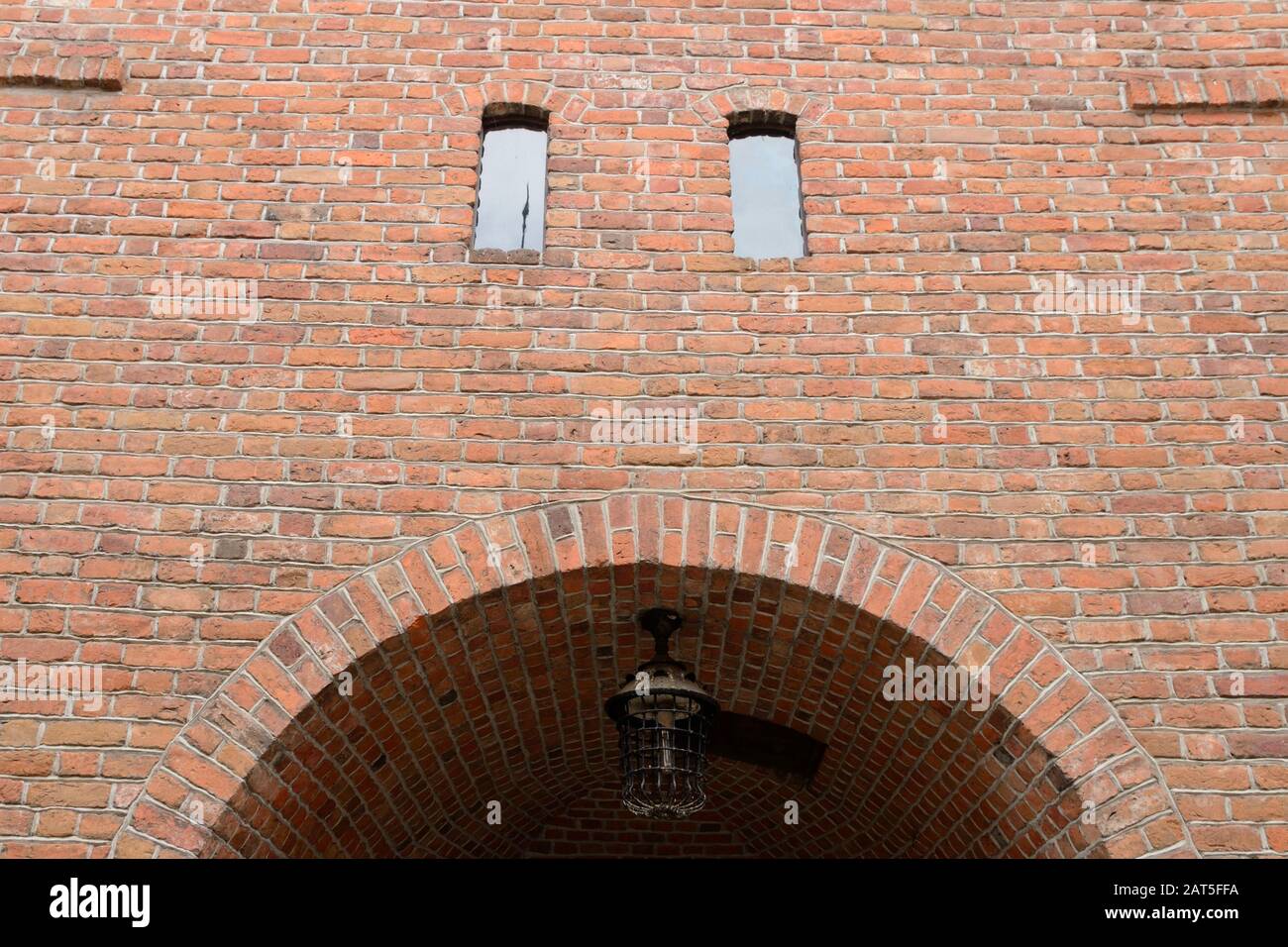 Brick arch in Barbican, fortified outpost in Warsaw, Poland Stock Photo ...