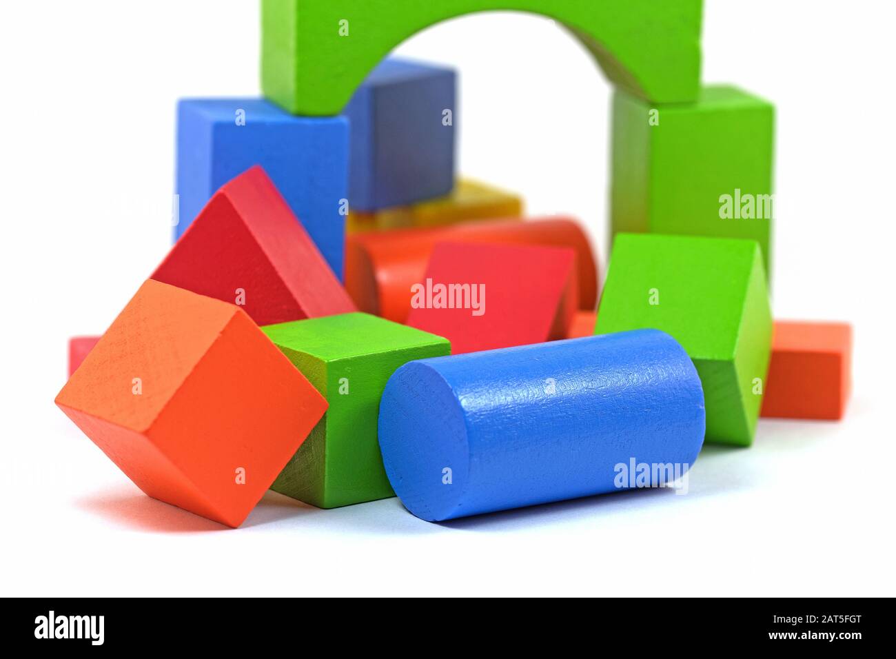 Colorful wooden building blocks against white background Stock Photo ...