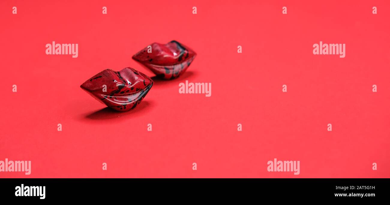 Red chocolate lips banner Stock Photo - Alamy