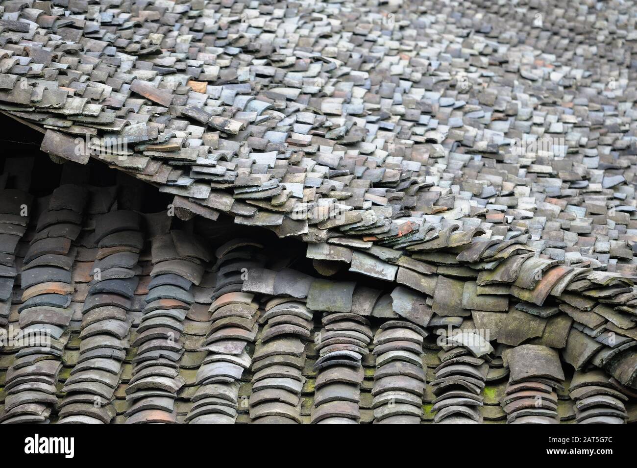 Tiles covering ancient Chinese barn Stock Photo - Alamy