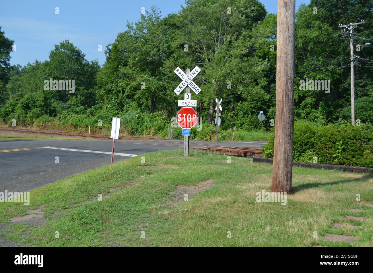 A stop sign at a rural railroad crossing Stock Photo - Alamy