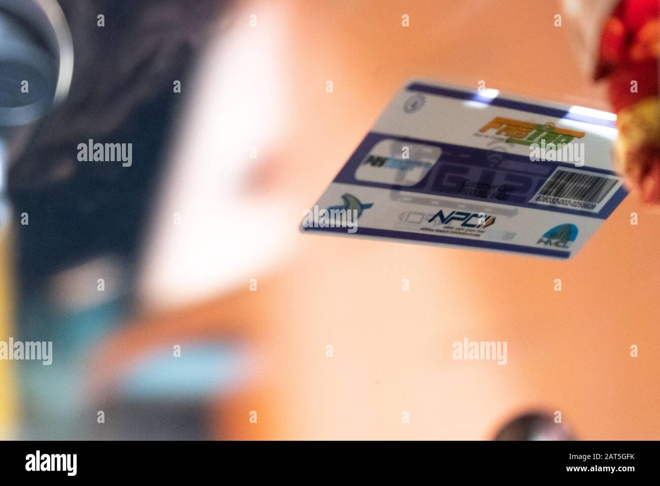 Fastag RFID stickers placed on a windsheild in India with bokeh ...