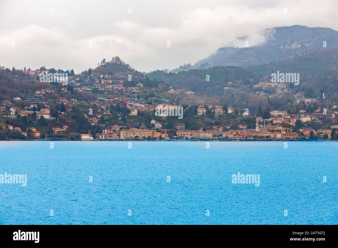 Evening view city Bellagio and Varenna Como water lake Italy blue sky ...