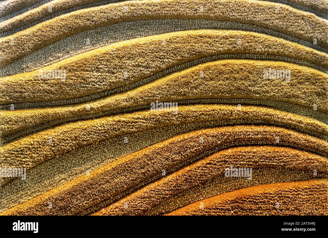 Yellow carpet with wavy texture. Woolen carpet background Stock Photo ...