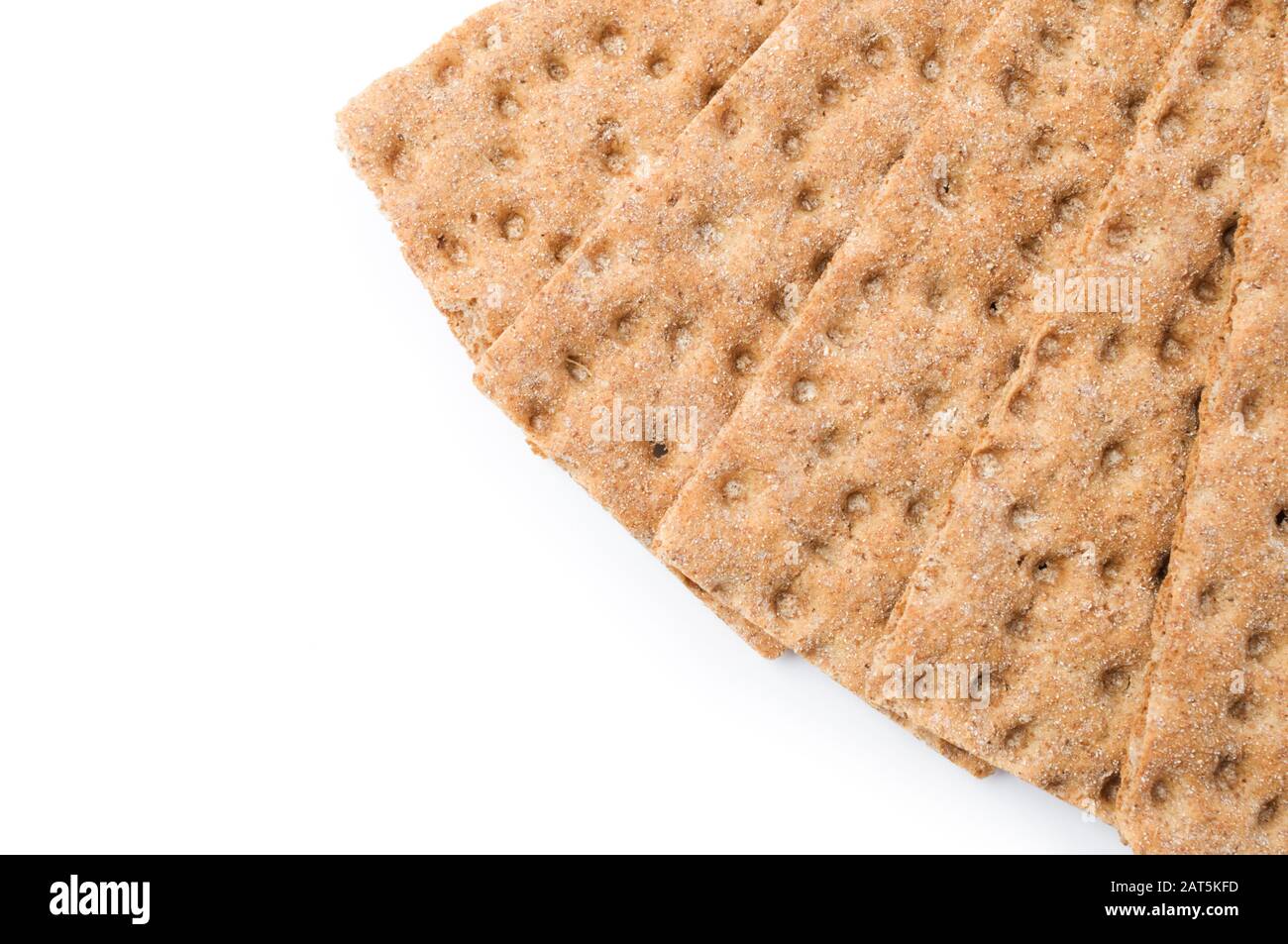 Crunchy crispbread on white background Stock Photo - Alamy