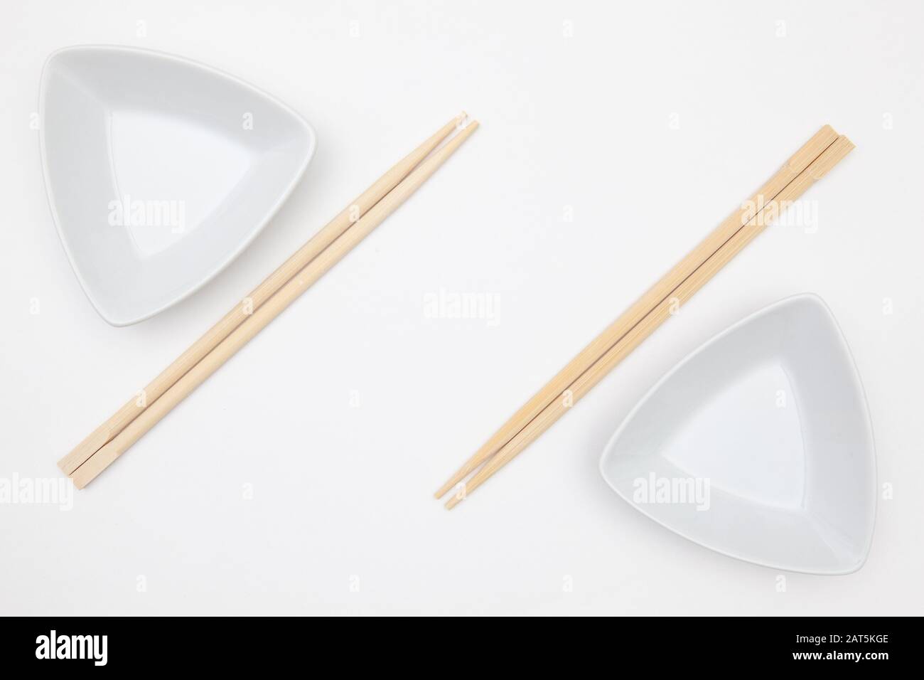 Top View Of White Empty Sushi Plates With Bamboo Chopsticks. Symmetry ...