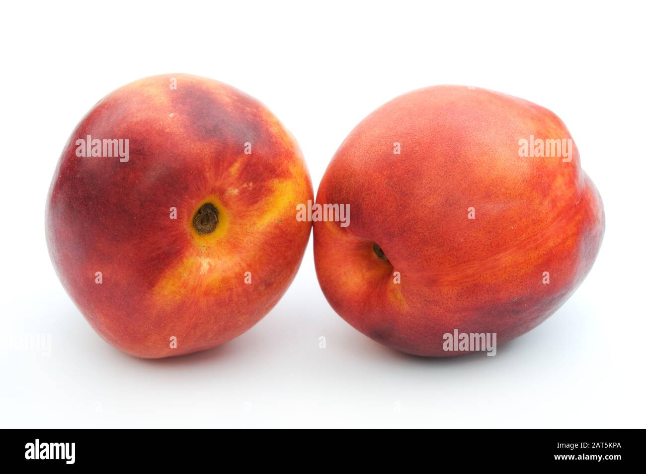 Nectarines on white background Stock Photo - Alamy
