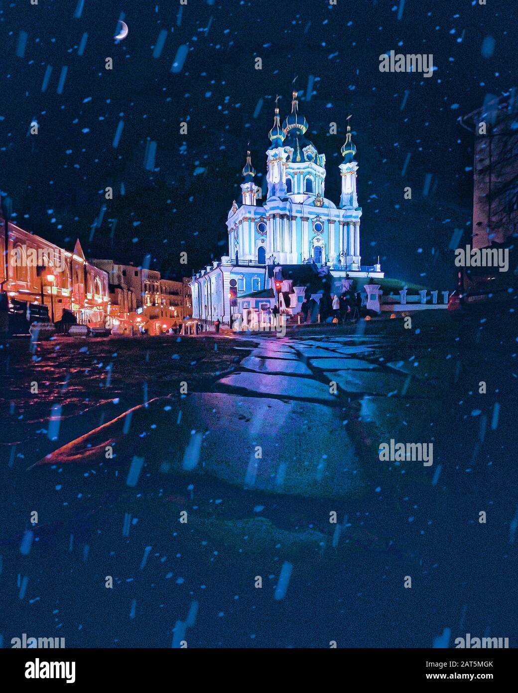 St. Andrew's Church in Kiev with snow flakes and night illumination ...