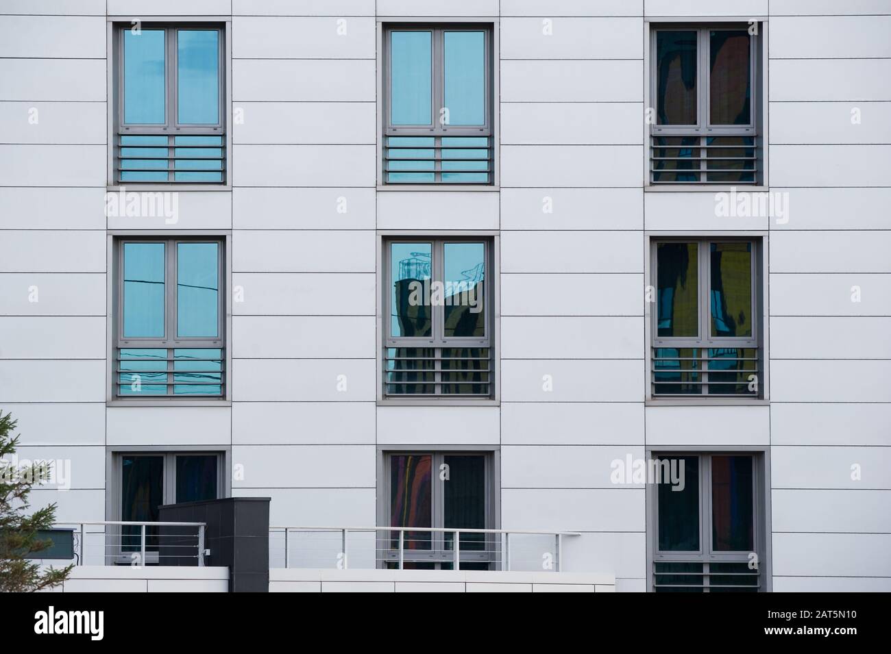 six-window wall of a modern gray building, texture Stock Photo - Alamy