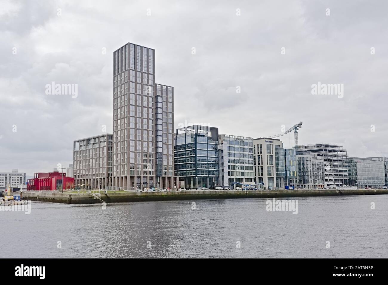 New highrise apartment and office buildings along Liffey river in in ...