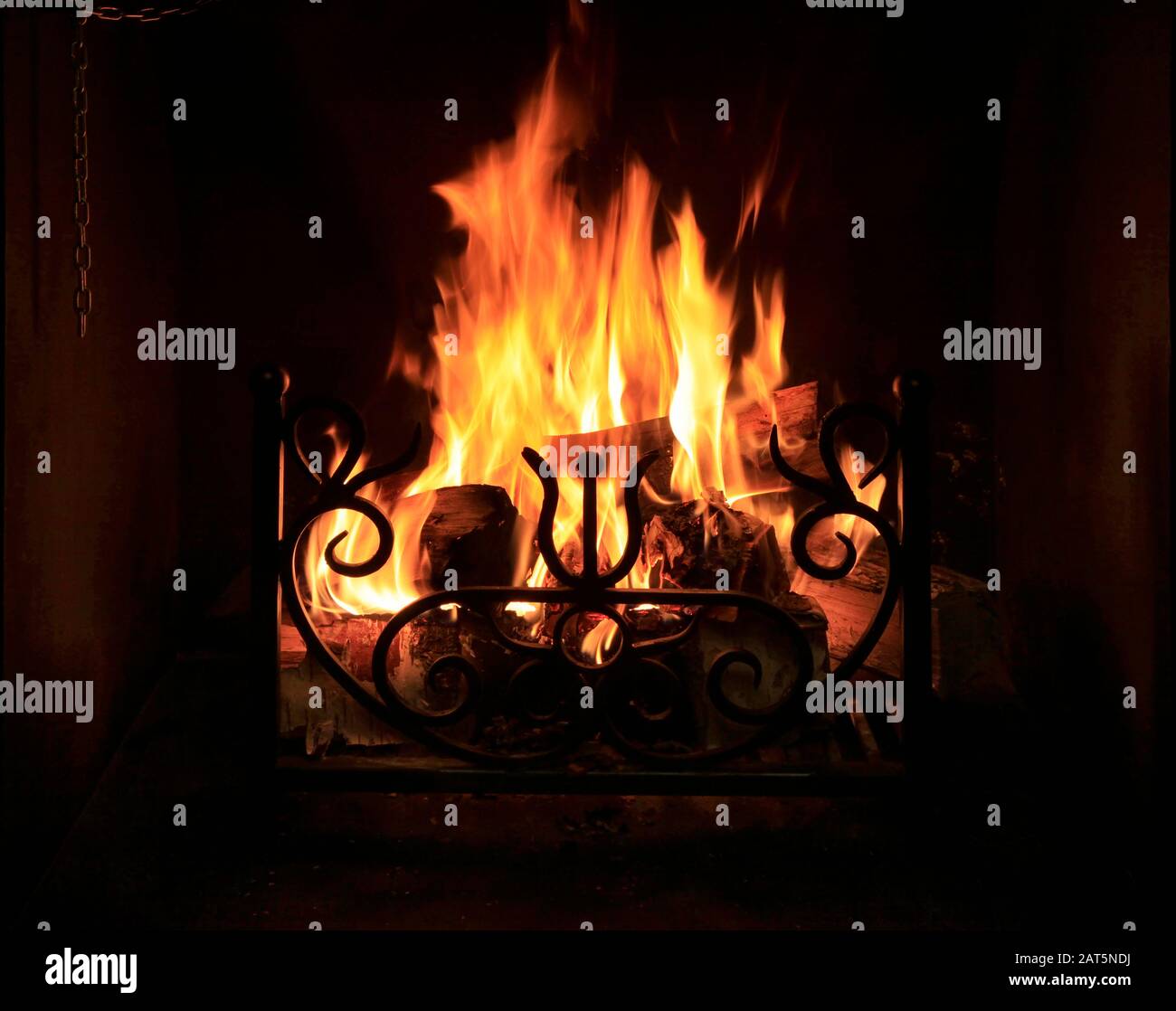 Fire with sparks in a beautiful fireplace Stock Photo - Alamy