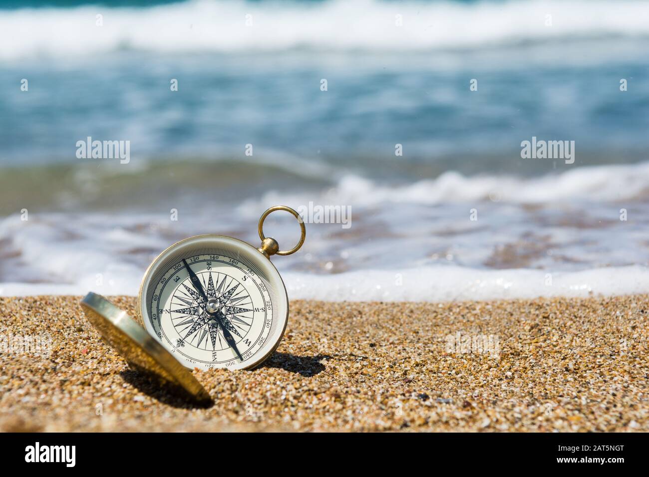 Vintage golden travel compass hi-res stock photography and images - Alamy