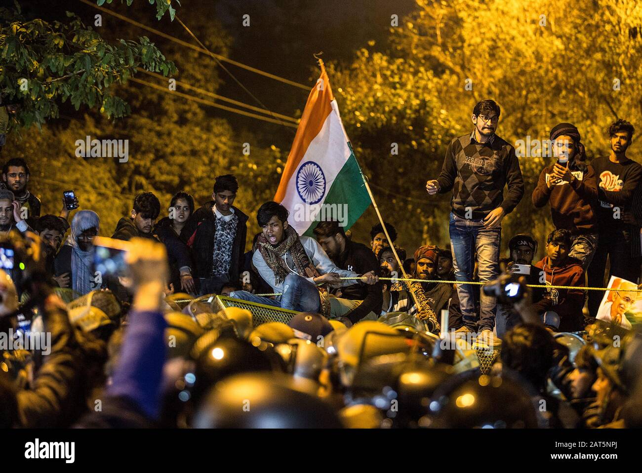 New Delhi, India. 30th Jan, 2020. Protestors confront with Indian ...