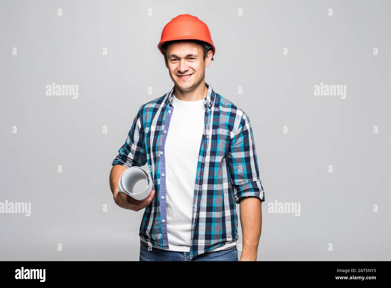 Engineer with blueprints isolated on white background Stock Photo - Alamy