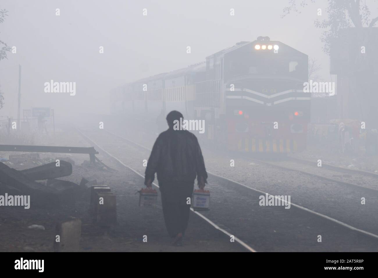 A view of the fog engulfs the provincial capital city after the heavy ...
