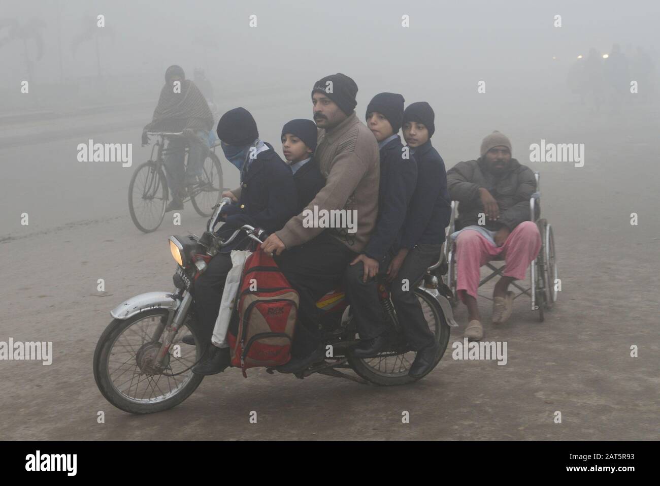A view of the fog engulfs the provincial capital city after the heavy ...