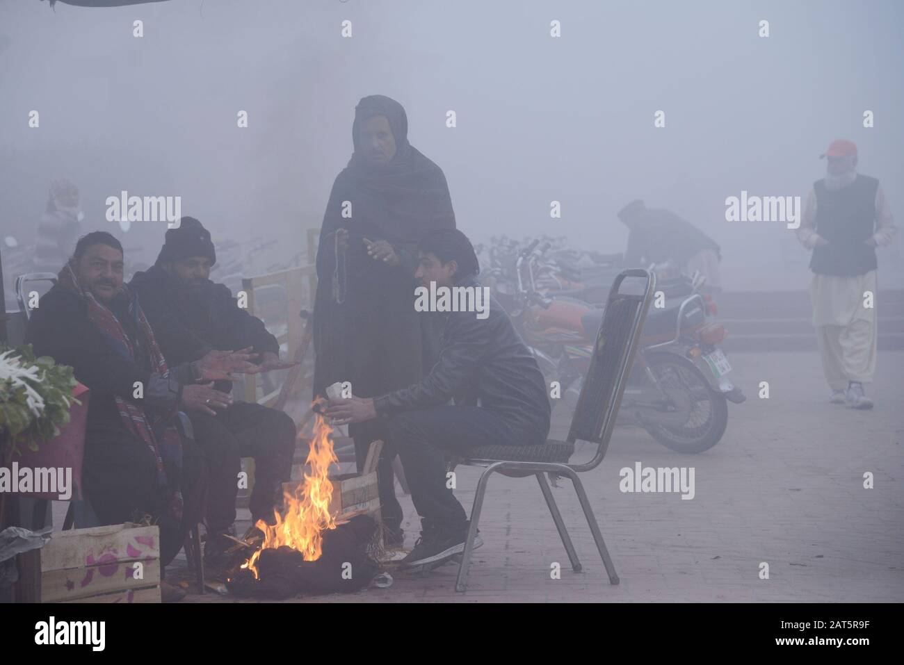 A view of the fog engulfs the provincial capital city after the heavy ...