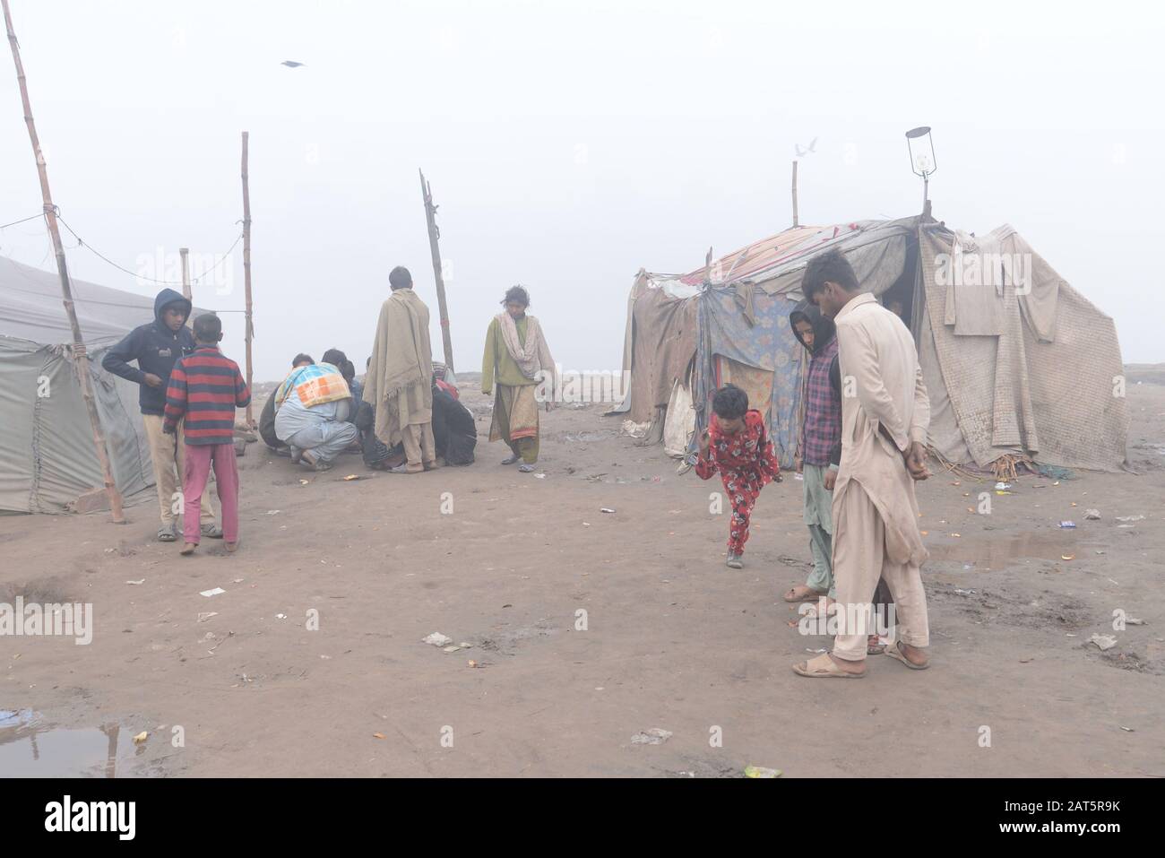 Pakistani poor children playing near river Ravi ahead of International ...