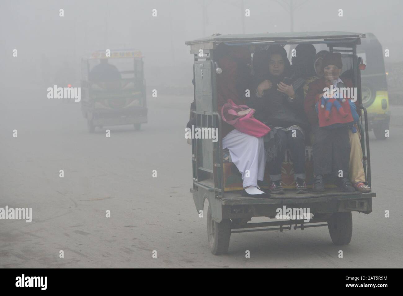 A view of the fog engulfs the provincial capital city after the heavy ...