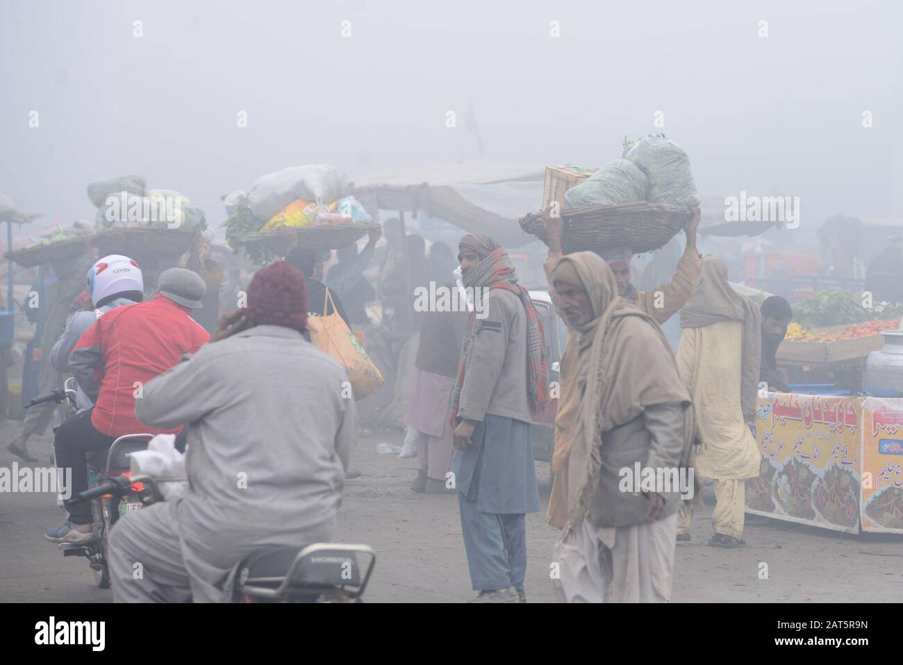 A view of the fog engulfs the provincial capital city after the heavy ...