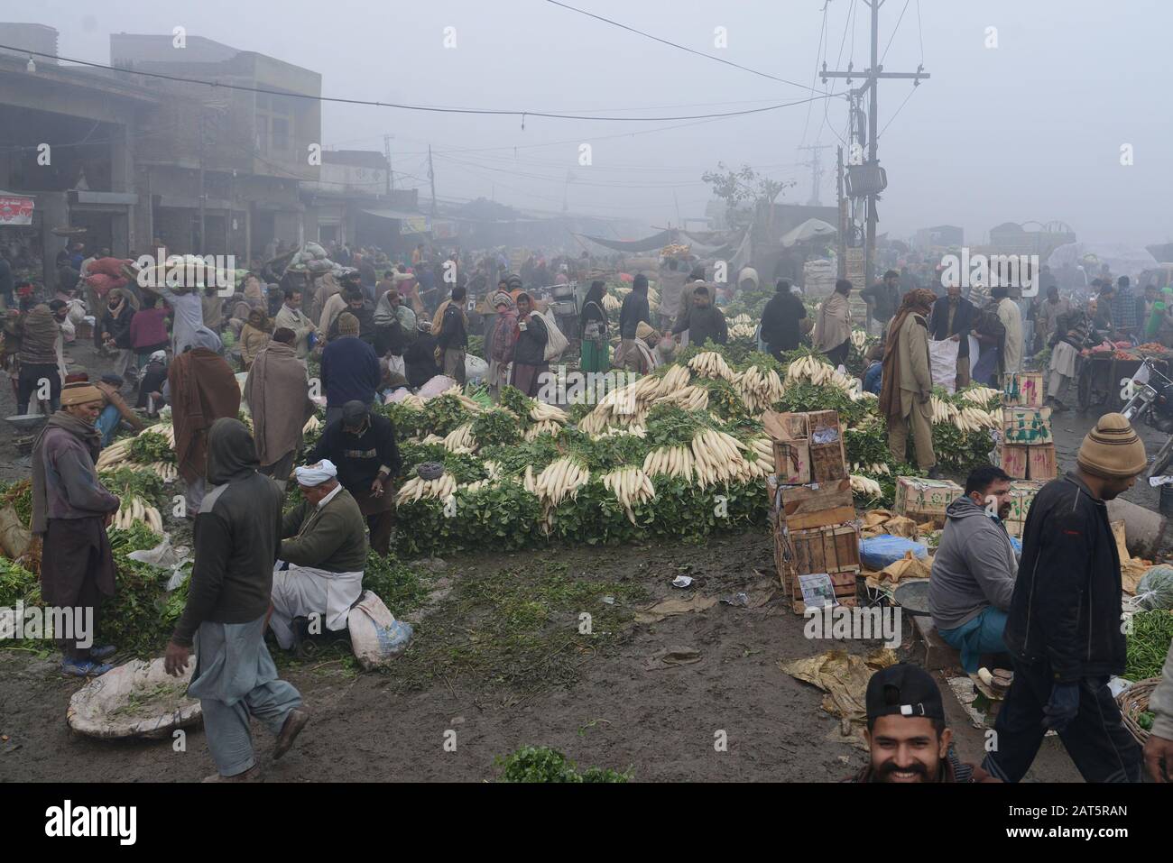 A view of the fog engulfs the provincial capital city after the heavy ...