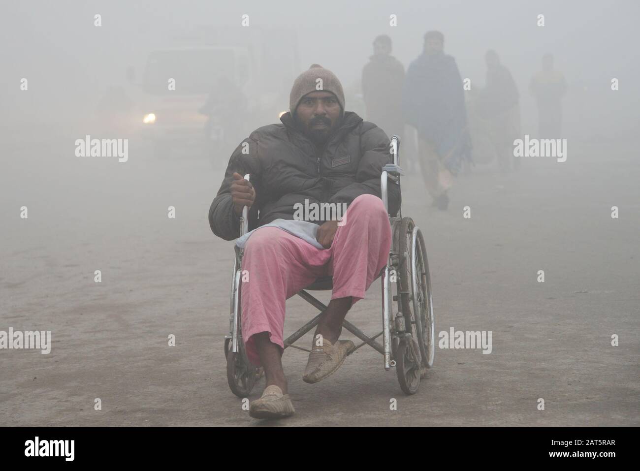 A view of the fog engulfs the provincial capital city after the heavy ...