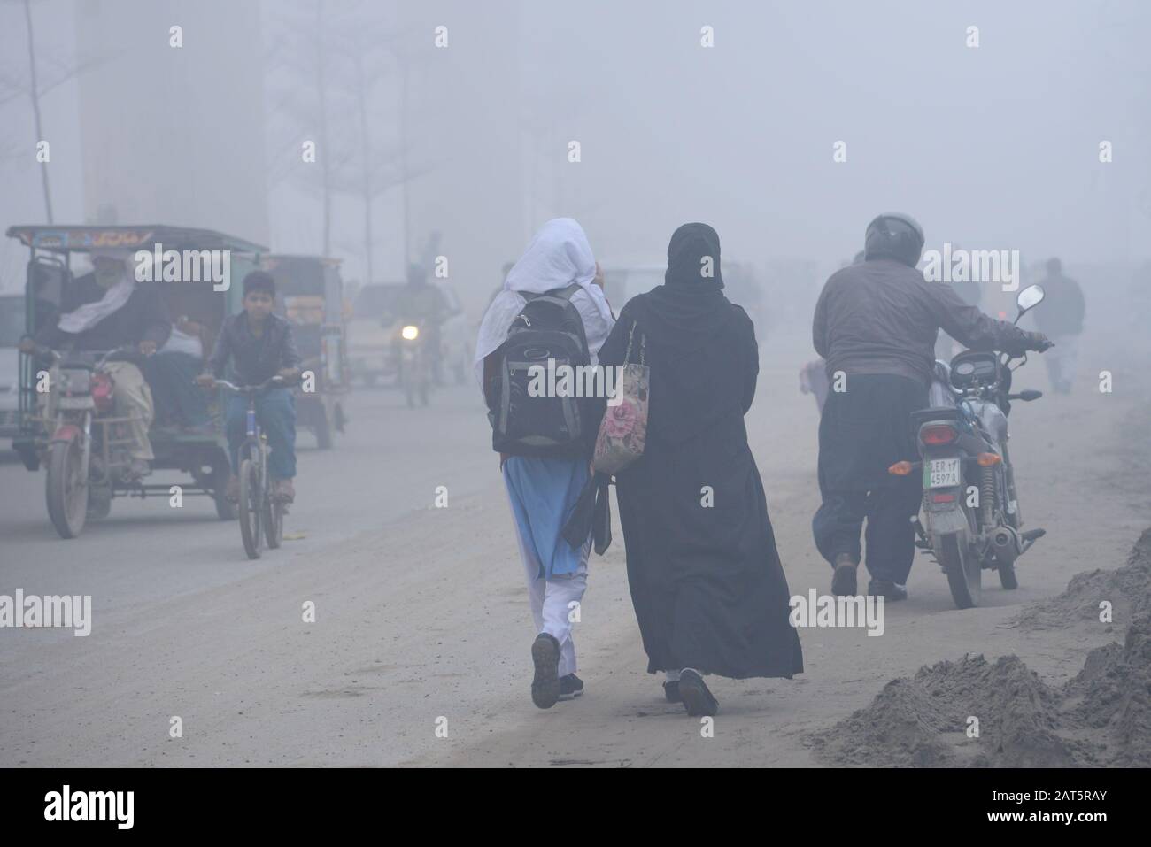 A view of the fog engulfs the provincial capital city after the heavy ...