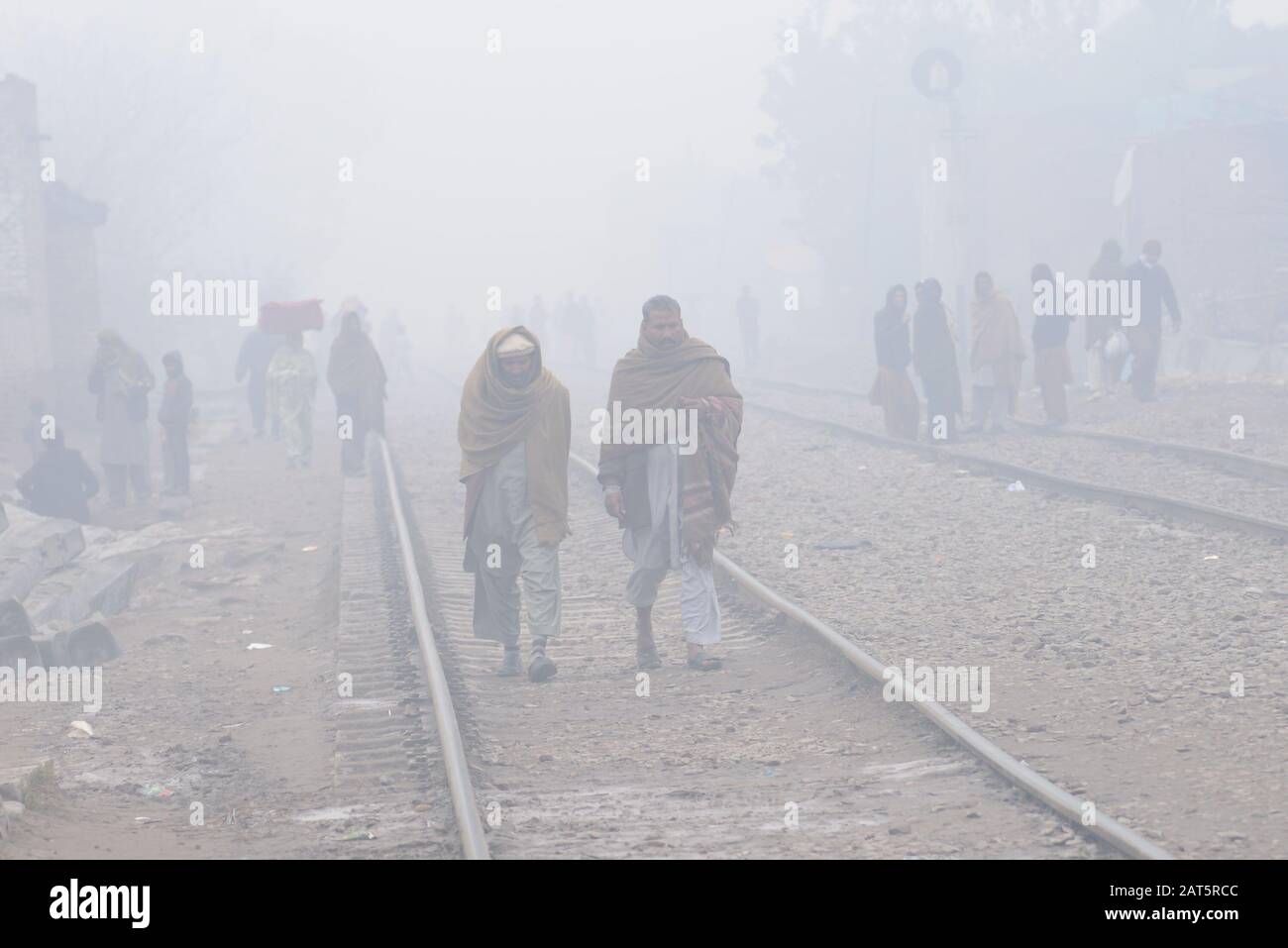 A view of the fog engulfs the provincial capital city after the heavy ...