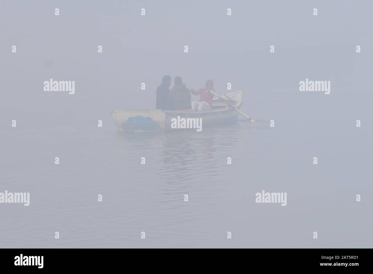 A view of the fog engulfs the provincial capital city after the heavy ...