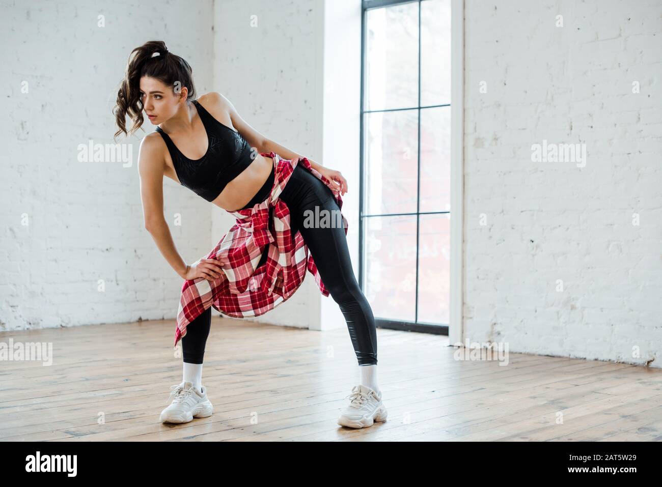 attractive girl posing while dancing jazz funk Stock Photo - Alamy