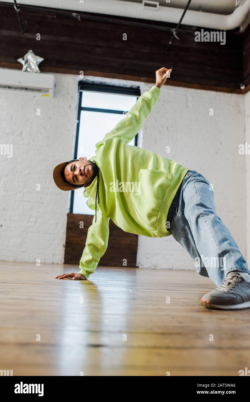 stylish african american dancer breakdancing in dance studio Stock ...