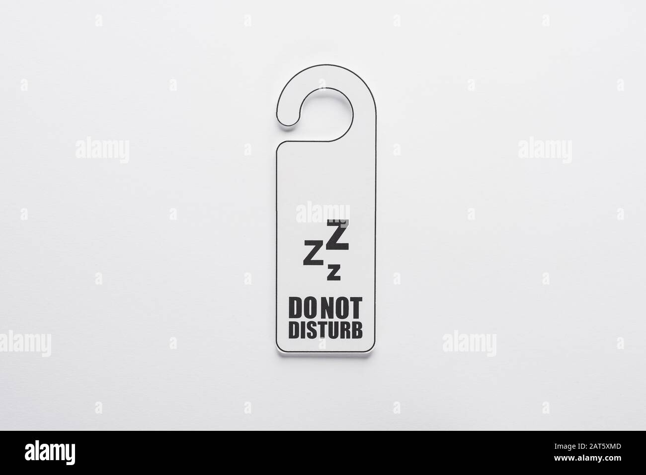 top view of do no disturb sign on white background Stock Photo - Alamy
