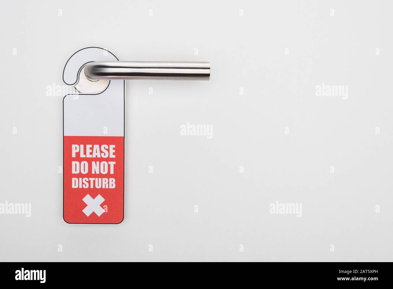 please do no disturb sign on handle on white background Stock Photo - Alamy