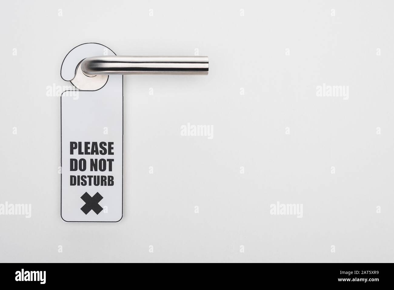 please do no disturb sign on handle on white background Stock Photo - Alamy