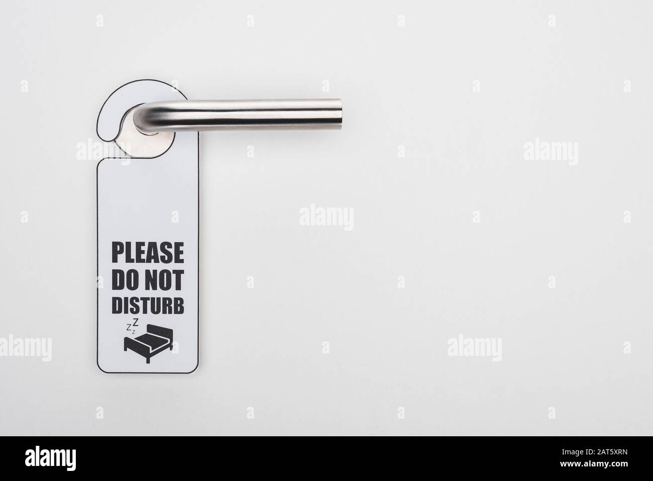 please do no disturb sign on handle on white background Stock Photo - Alamy
