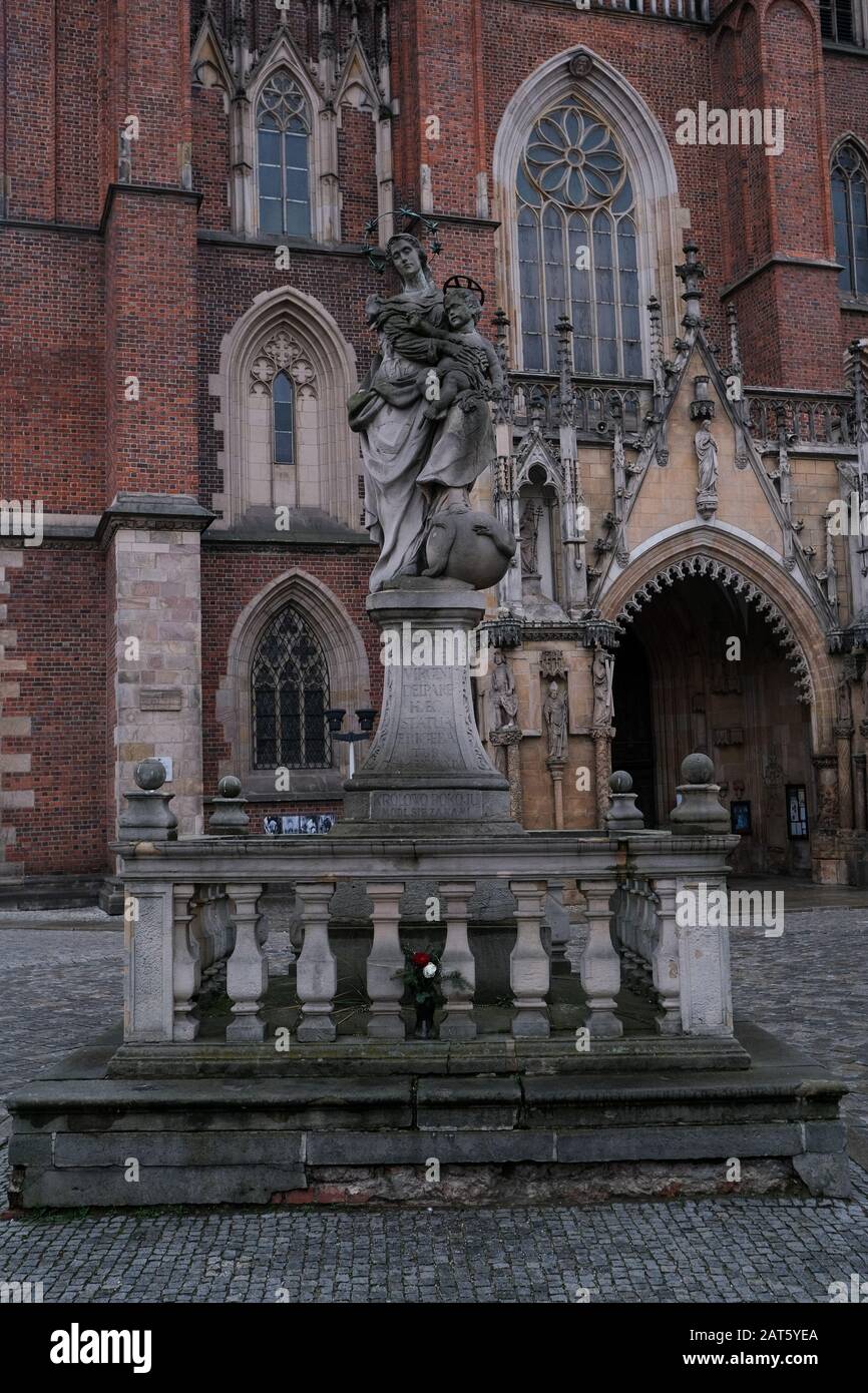 Poland, Wroclaw- 20 January 2020: Statue of Madonna and Child in front ...