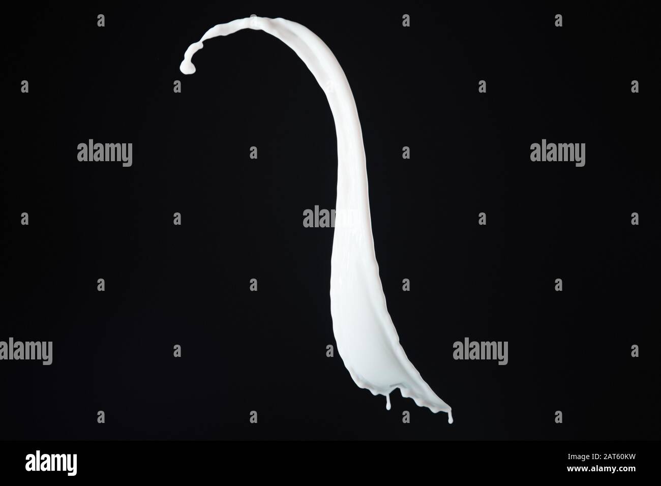 fresh white milk splash isolated on black Stock Photo - Alamy