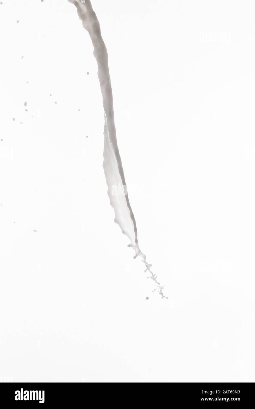 pure fresh white milk splash isolated on white Stock Photo - Alamy