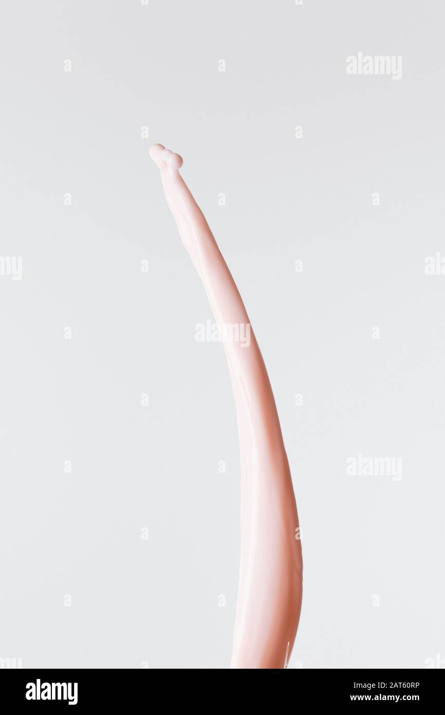 smooth fresh pink milk splash isolated on white Stock Photo - Alamy