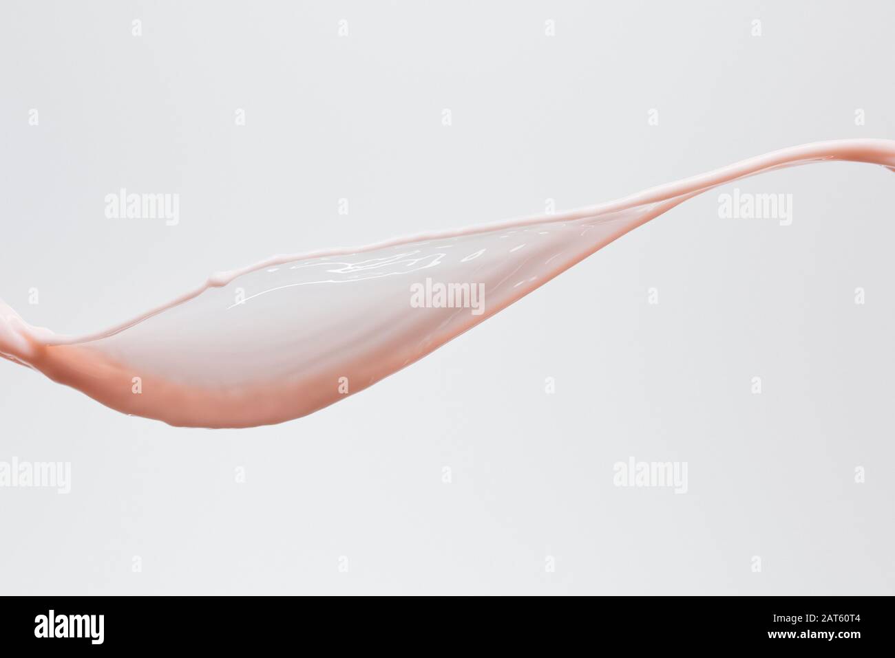smooth fresh pink milk splash isolated on white Stock Photo - Alamy