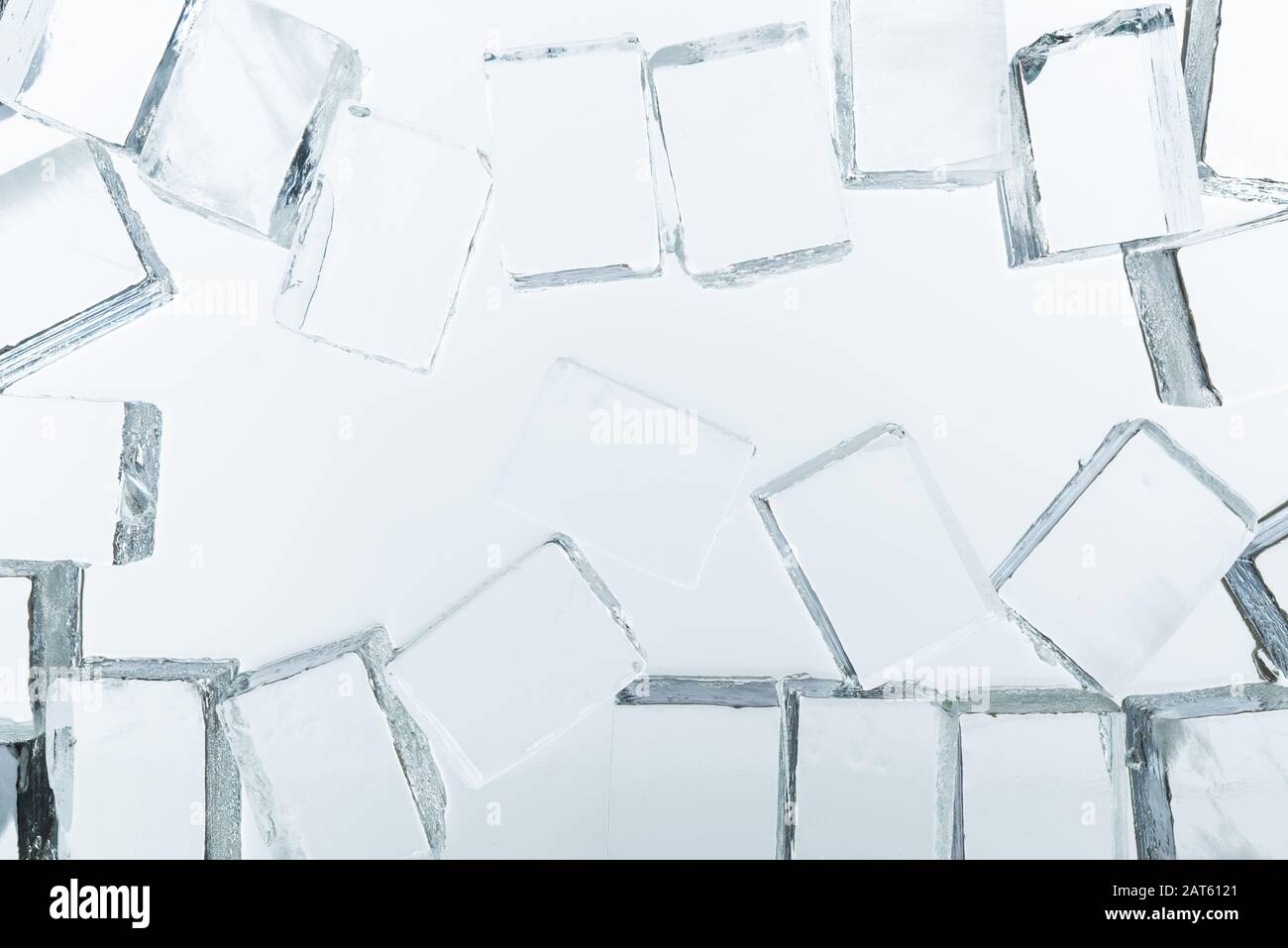 top view of transparent clear square ice cubes on mirror Stock Photo ...