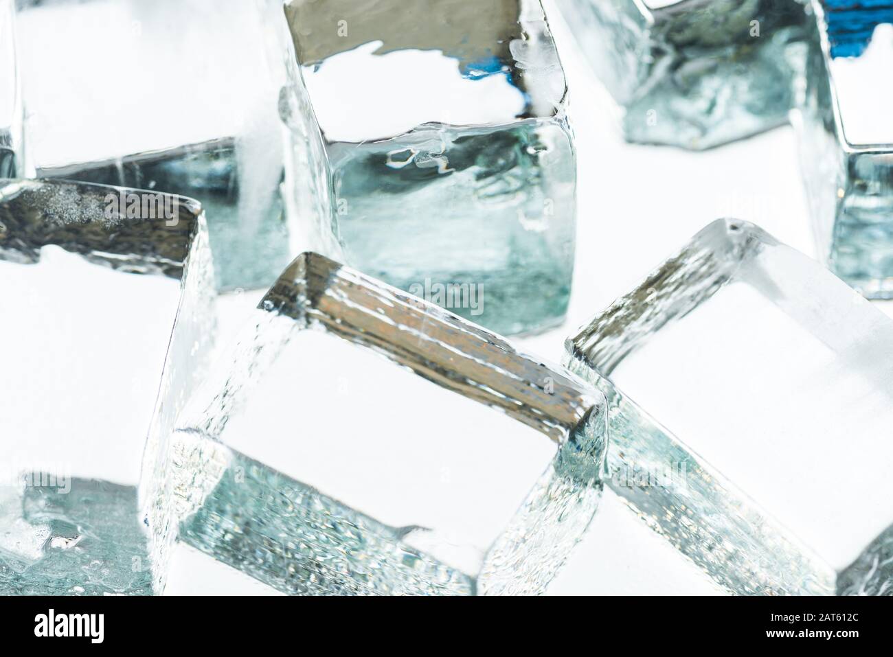 close up view of melting transparent clear square ice cubes Stock Photo ...