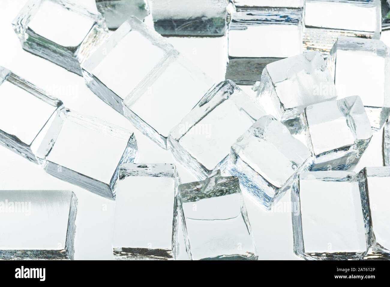 transparent clear square ice cubes on mirror Stock Photo - Alamy