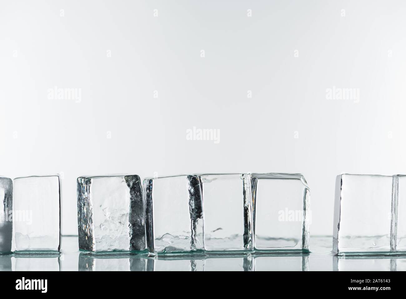 transparent clear square ice cubes in line isolated on white Stock ...