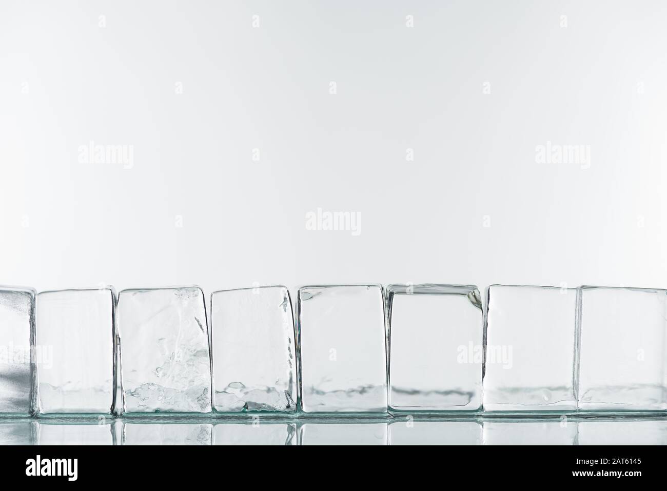 transparent clear square ice cubes in line isolated on white Stock ...