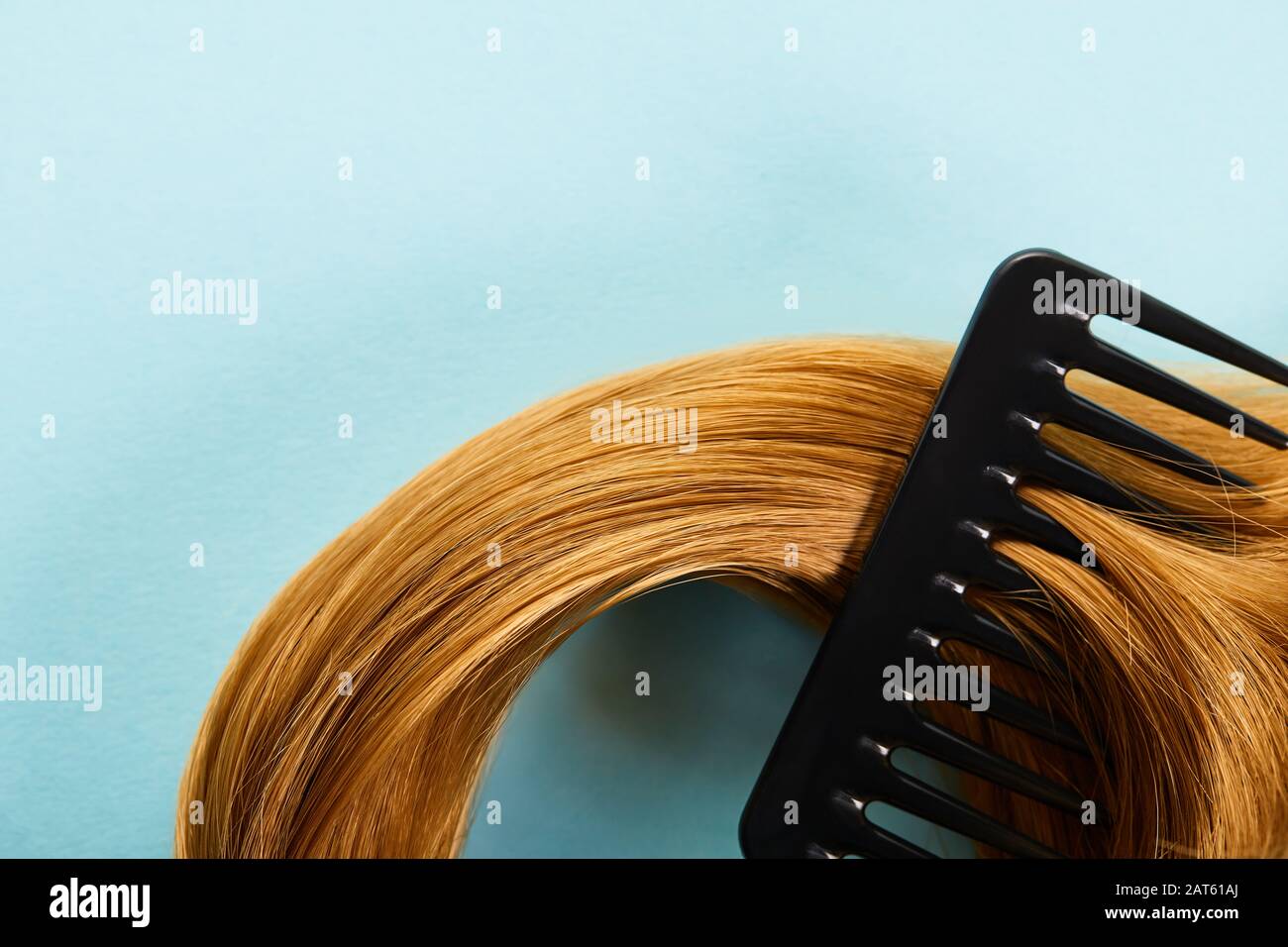Blue comb in hair hi-res stock photography and images - Alamy